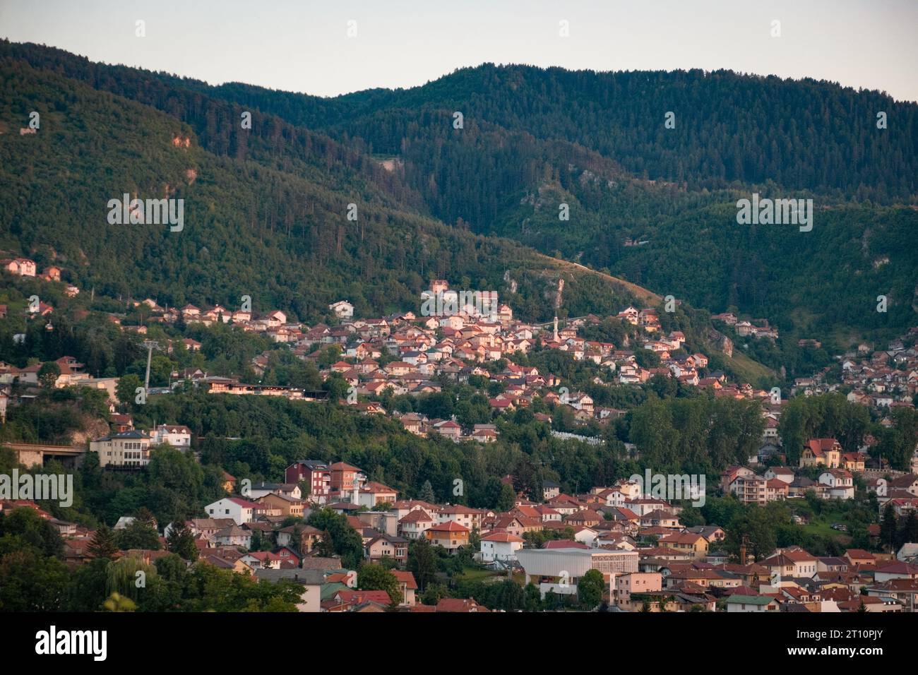 A picturesque scene of Bosnia's charming uphill houses basking in the ...