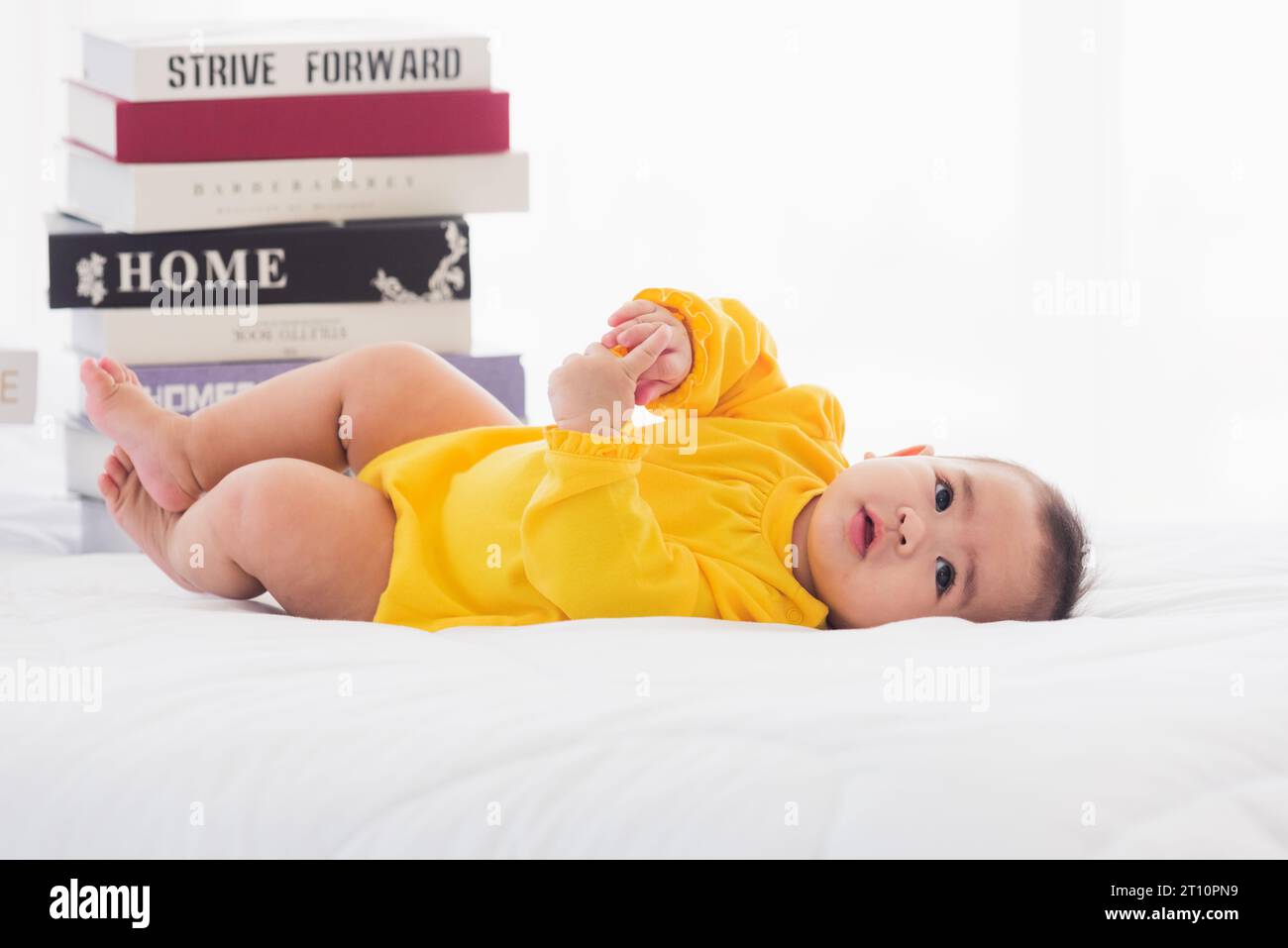 Baby book tower hi-res stock photography and images - Alamy