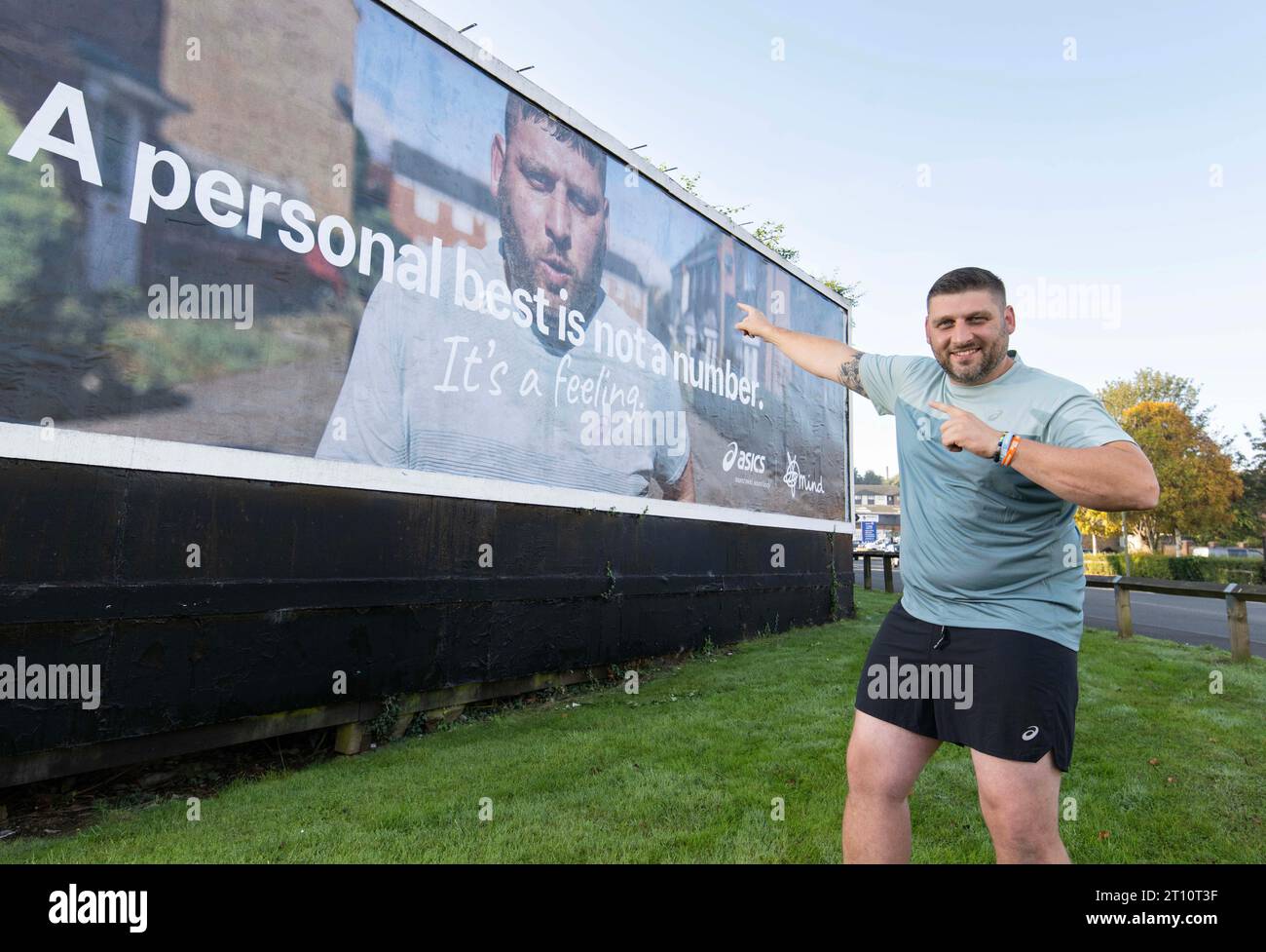 EDITORIAL USE ONLY Tom Durnin, ASICS ambassador, views a billboard ...