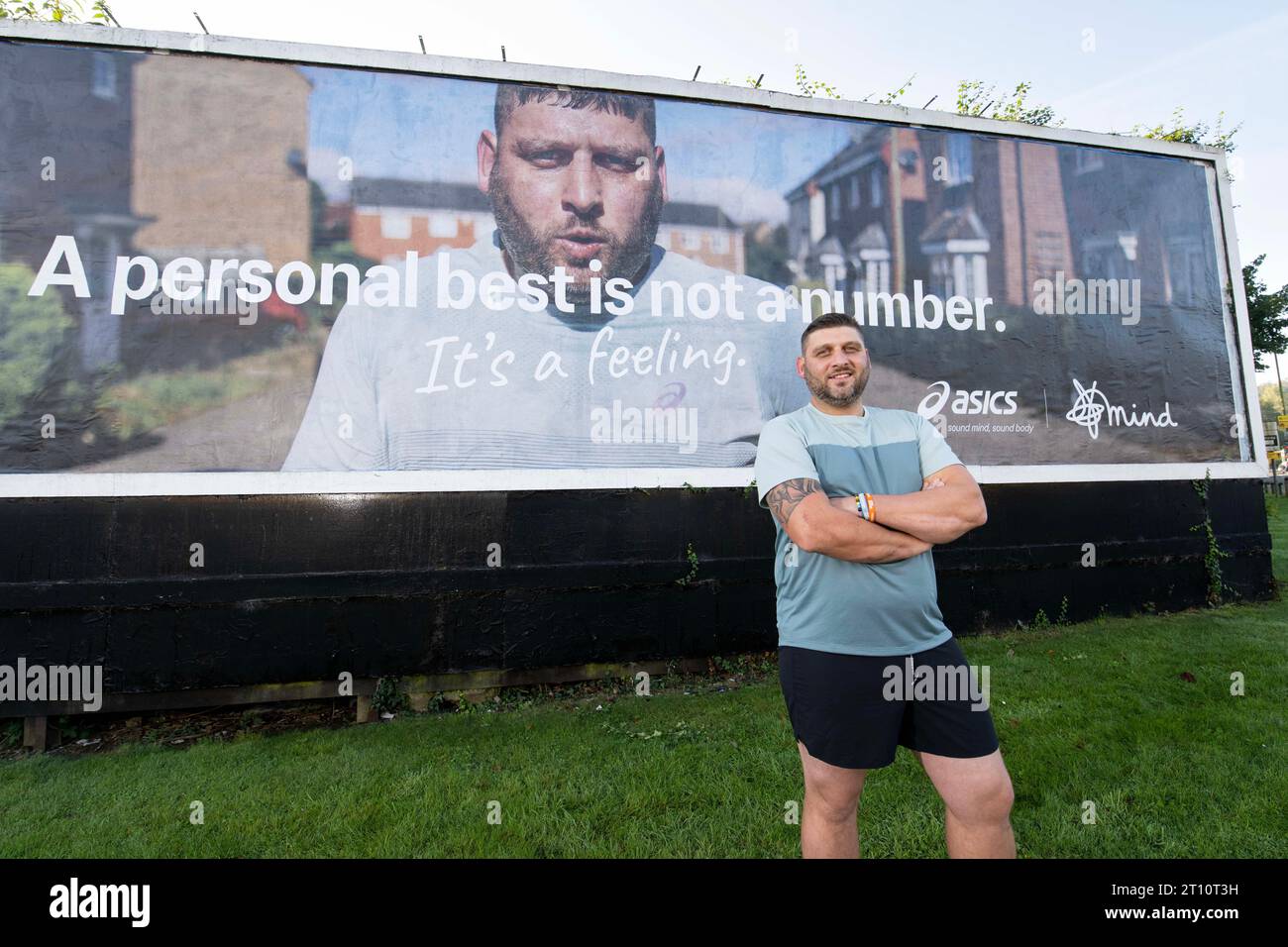 EDITORIAL USE ONLY Tom Durnin, ASICS ambassador, views a billboard ...
