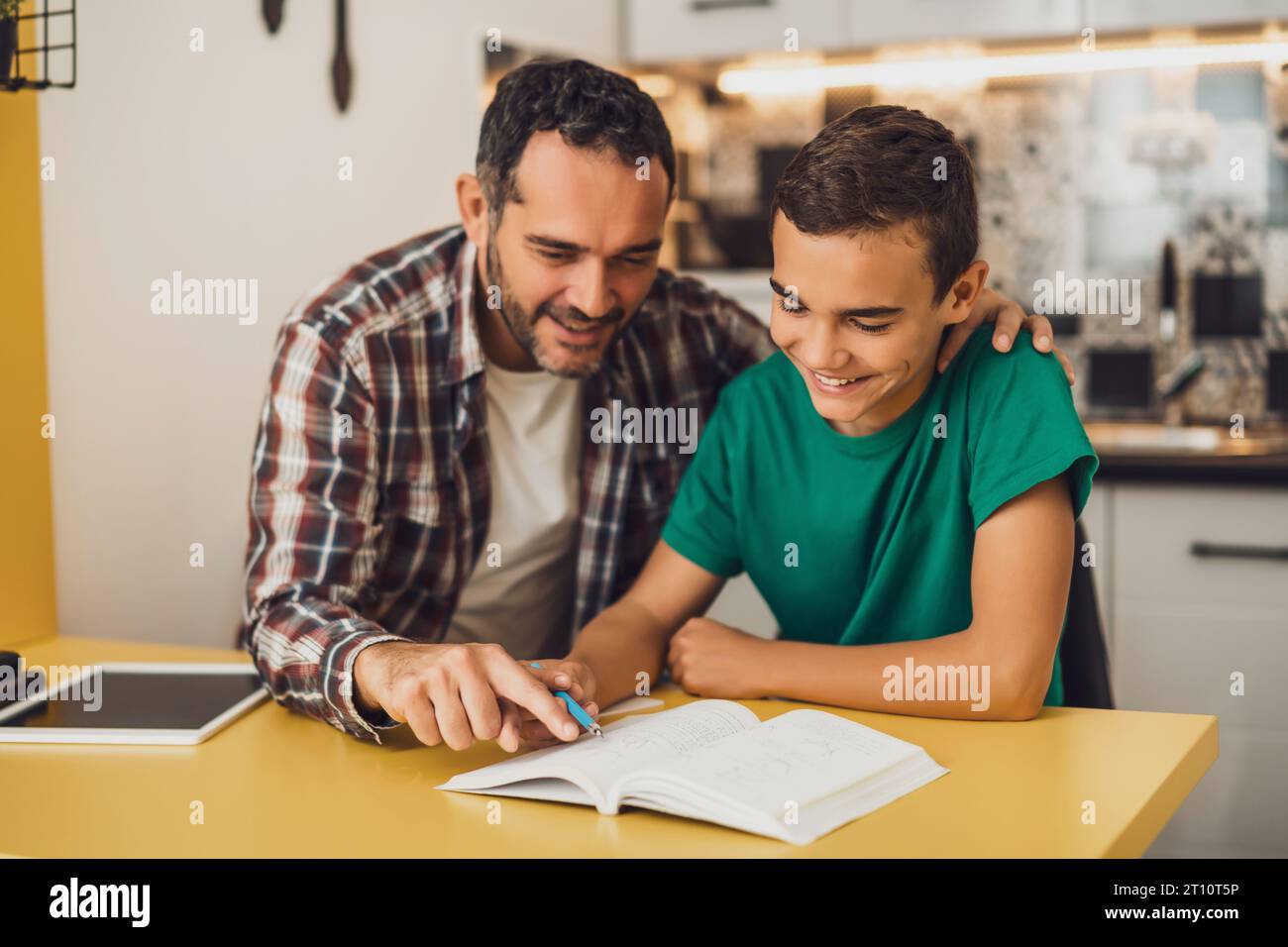 Father son homework hi-res stock photography and images - Alamy