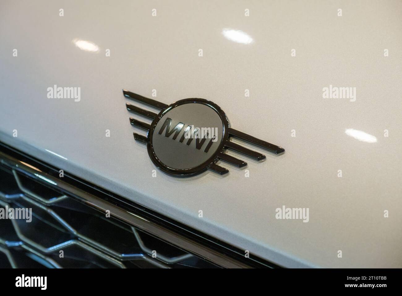 MINI electric car logo emblem close up Stock Photo - Alamy