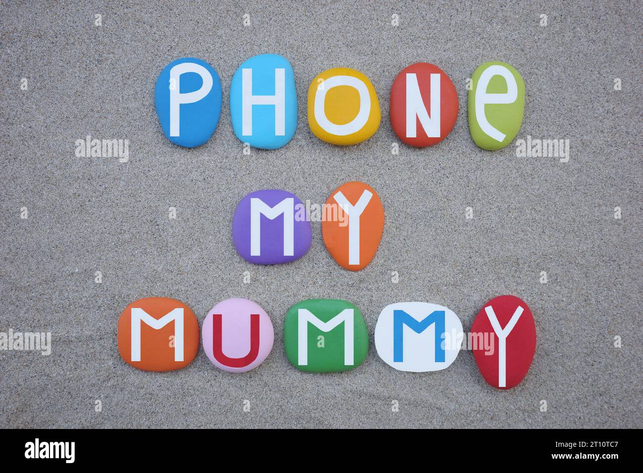 Phone my mummy, creative slogan composed with hand painted stone ...