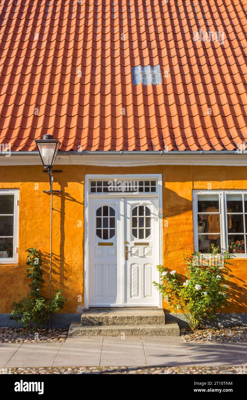 White door of a typical Danish house in historic village Christiansfeld ...