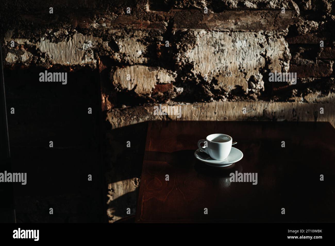 A cup of coffee in a vintage rustic coffee shop. Minimalism. Concept ...