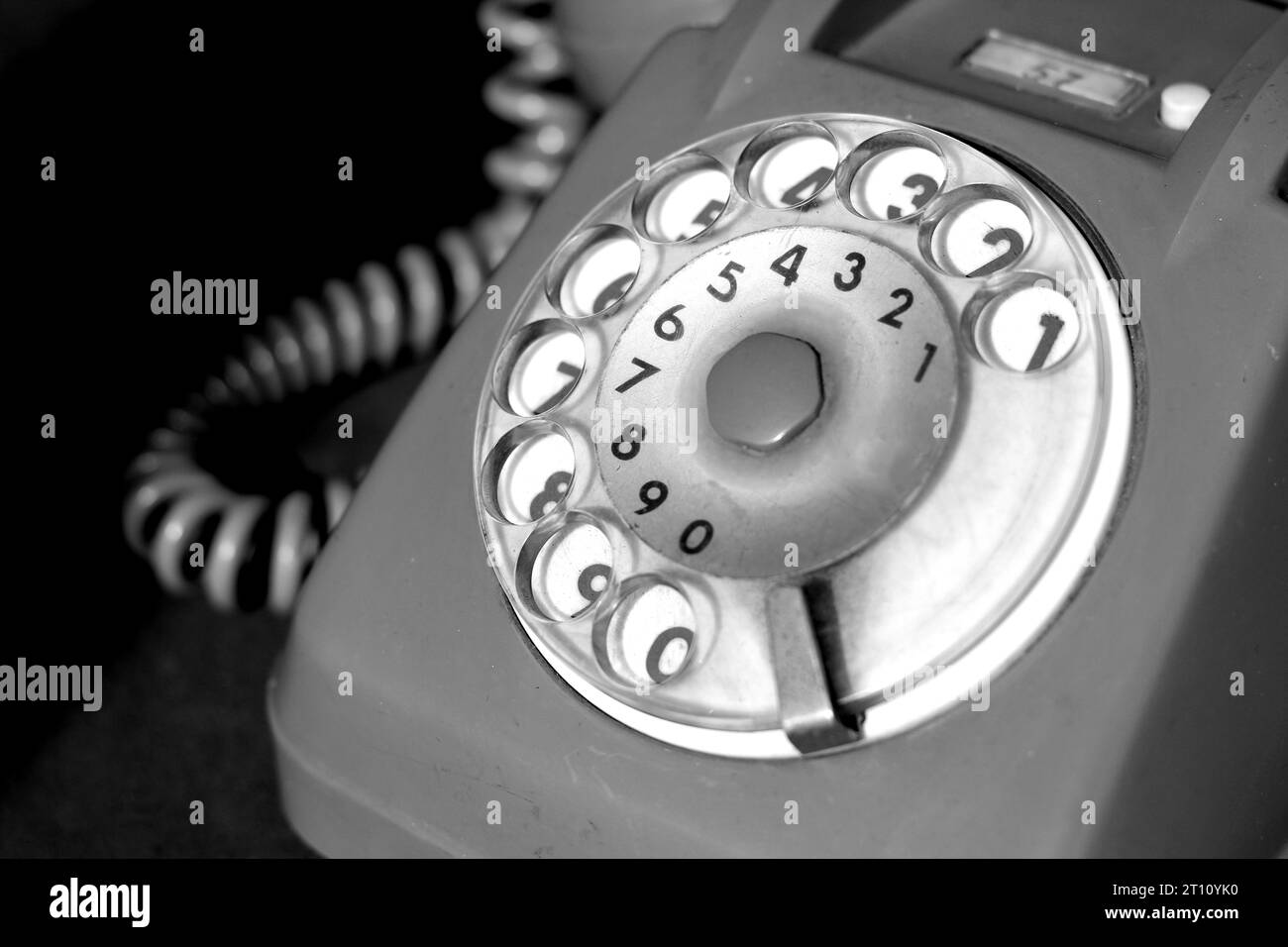 Old telephone 70s with rotary dial, Black and white Stock Photo - Alamy