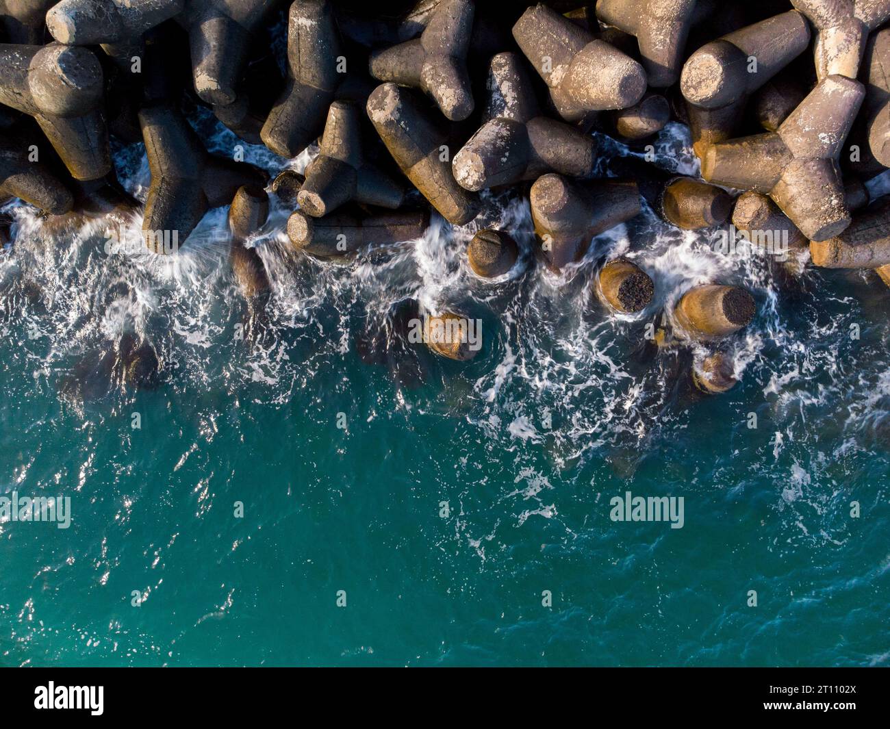 Aerial top drone view of a breakwater. breakwater in the sea, a ...