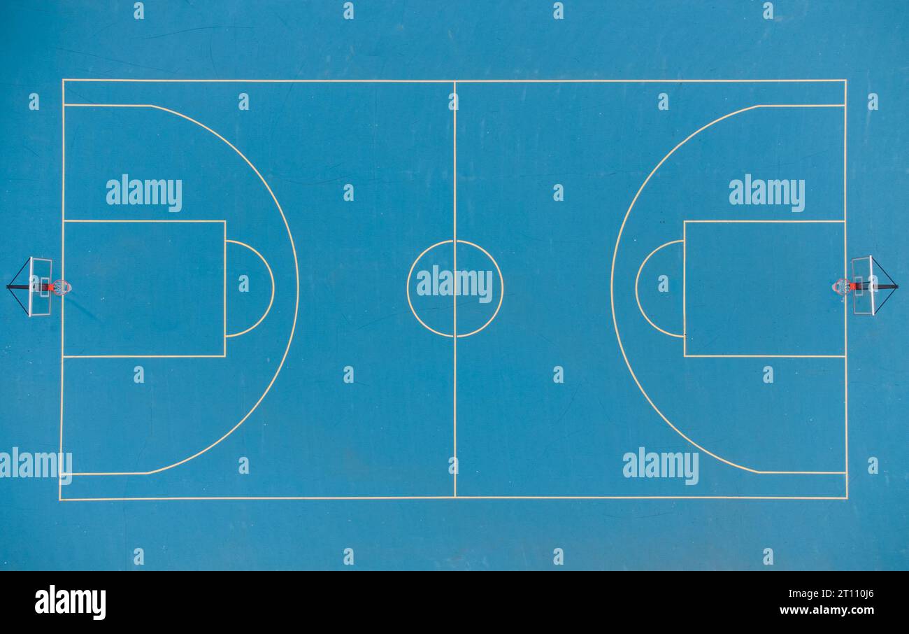 Aerial top view of the deserted basketball blue court Stock Photo - Alamy