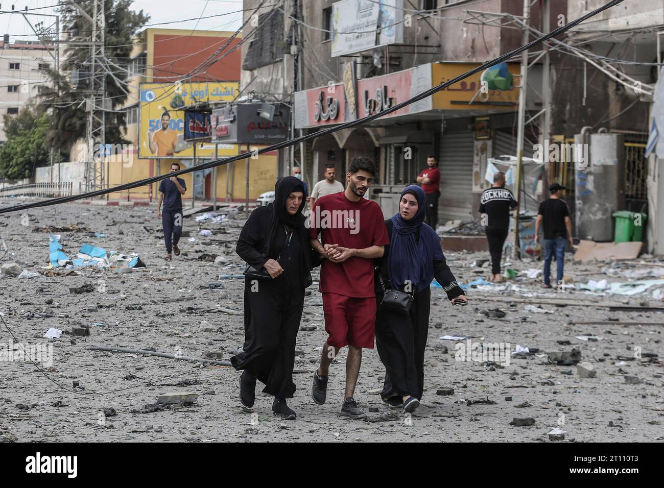 Gaza City, Palestinian Territories. 10th Oct, 2023. Palestinians walk ...