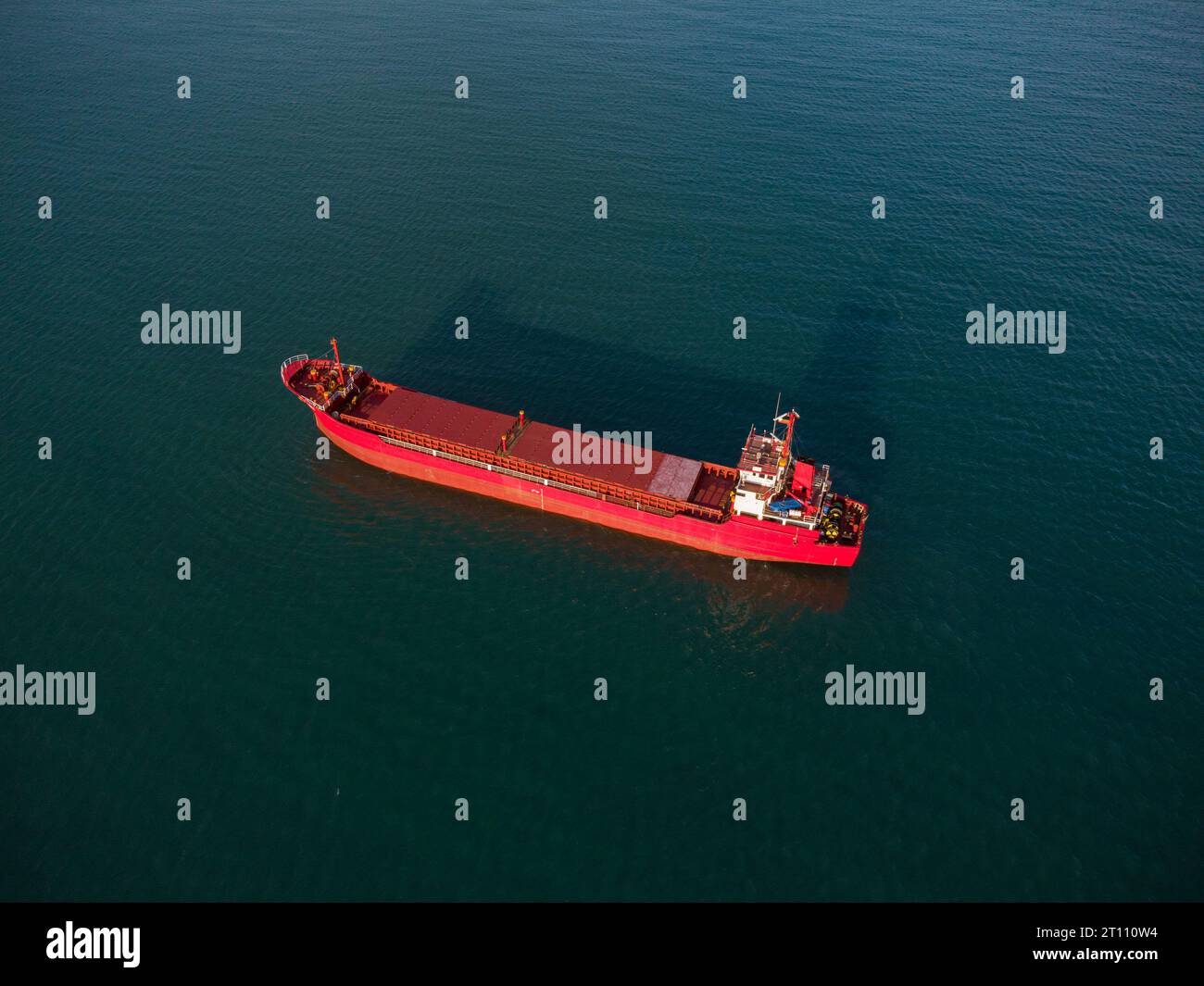 Large general cargo ship, Top down aerial Stock Photo - Alamy