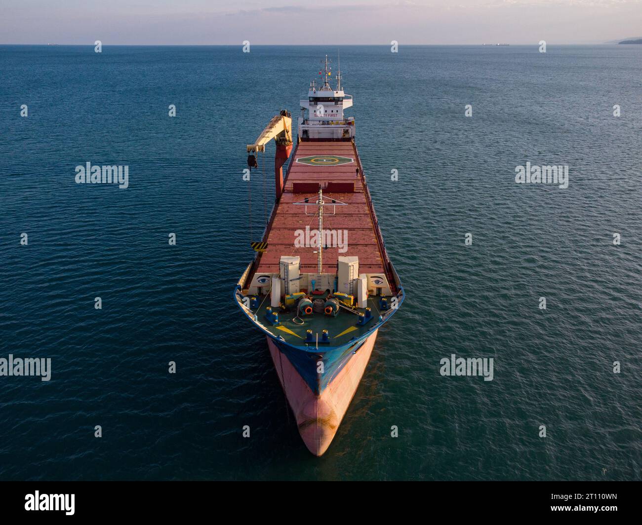 Large general cargo ship, Top down aerial Stock Photo - Alamy