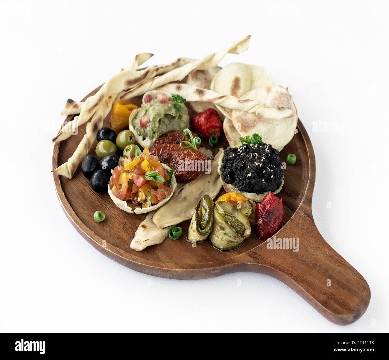 vegan tapas snacks sharing wood board platter on white background Stock ...