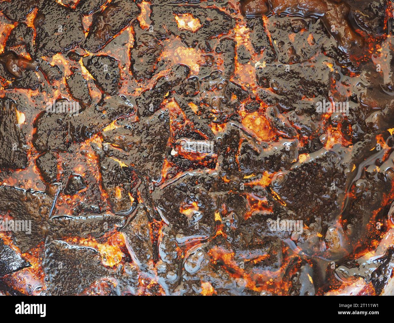 molten rock lava from a volcano useful as background Stock Photo - Alamy
