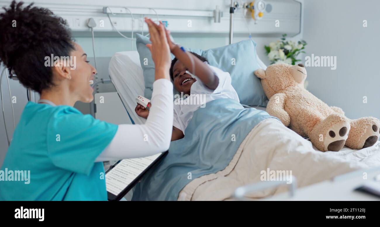 Happy woman, doctor and high five with child patient for success ...