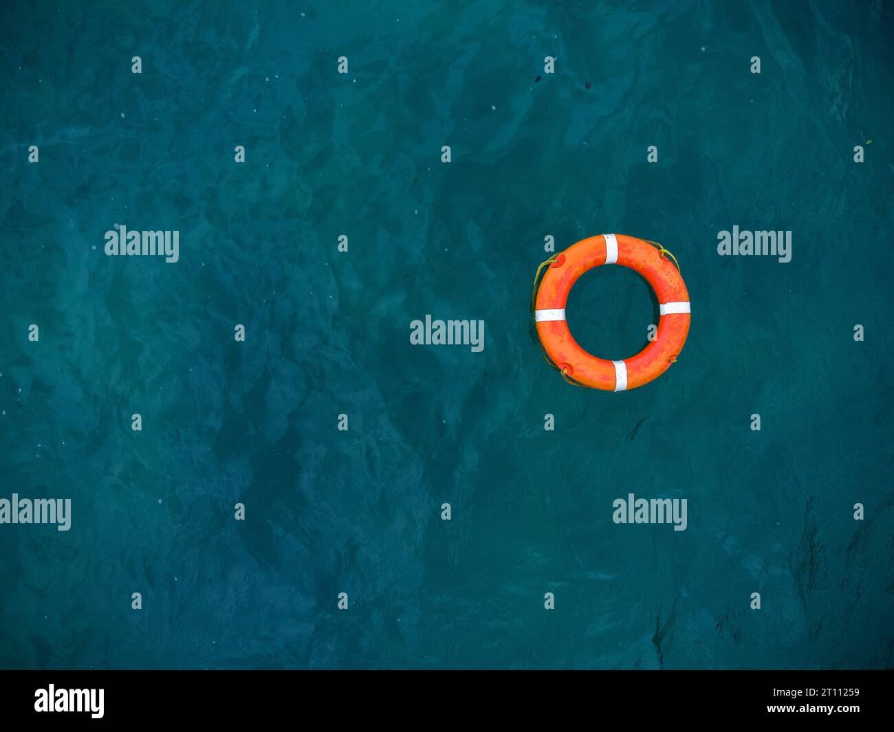 Aerial view of lifebuoy in the sea. Life ring floating in a sea Stock ...