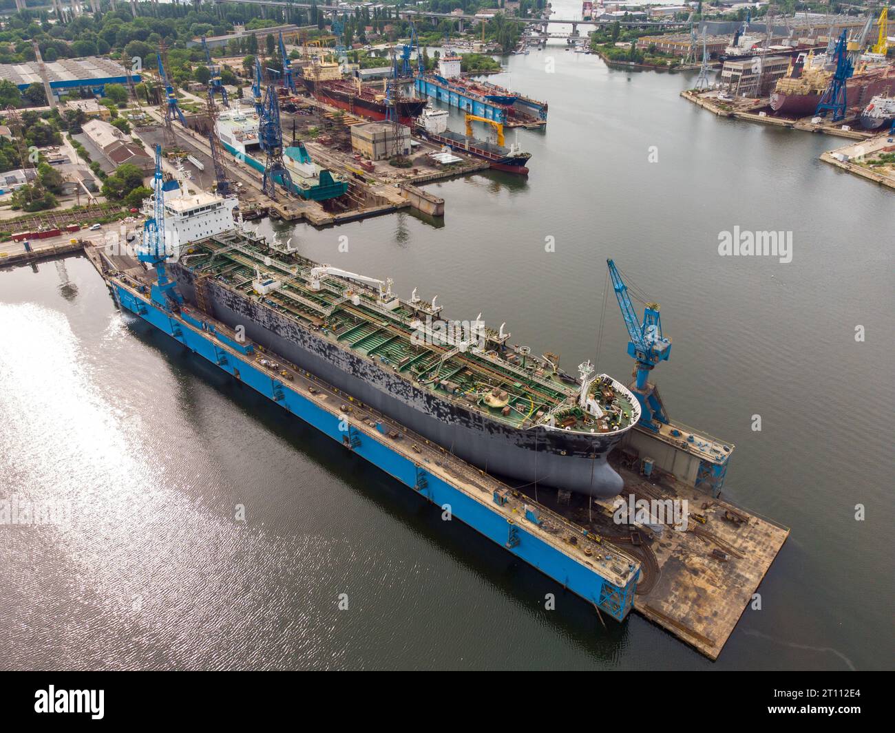 Tanker vessel repair in dry dock Shipyard, aerial top view Stock Photo ...