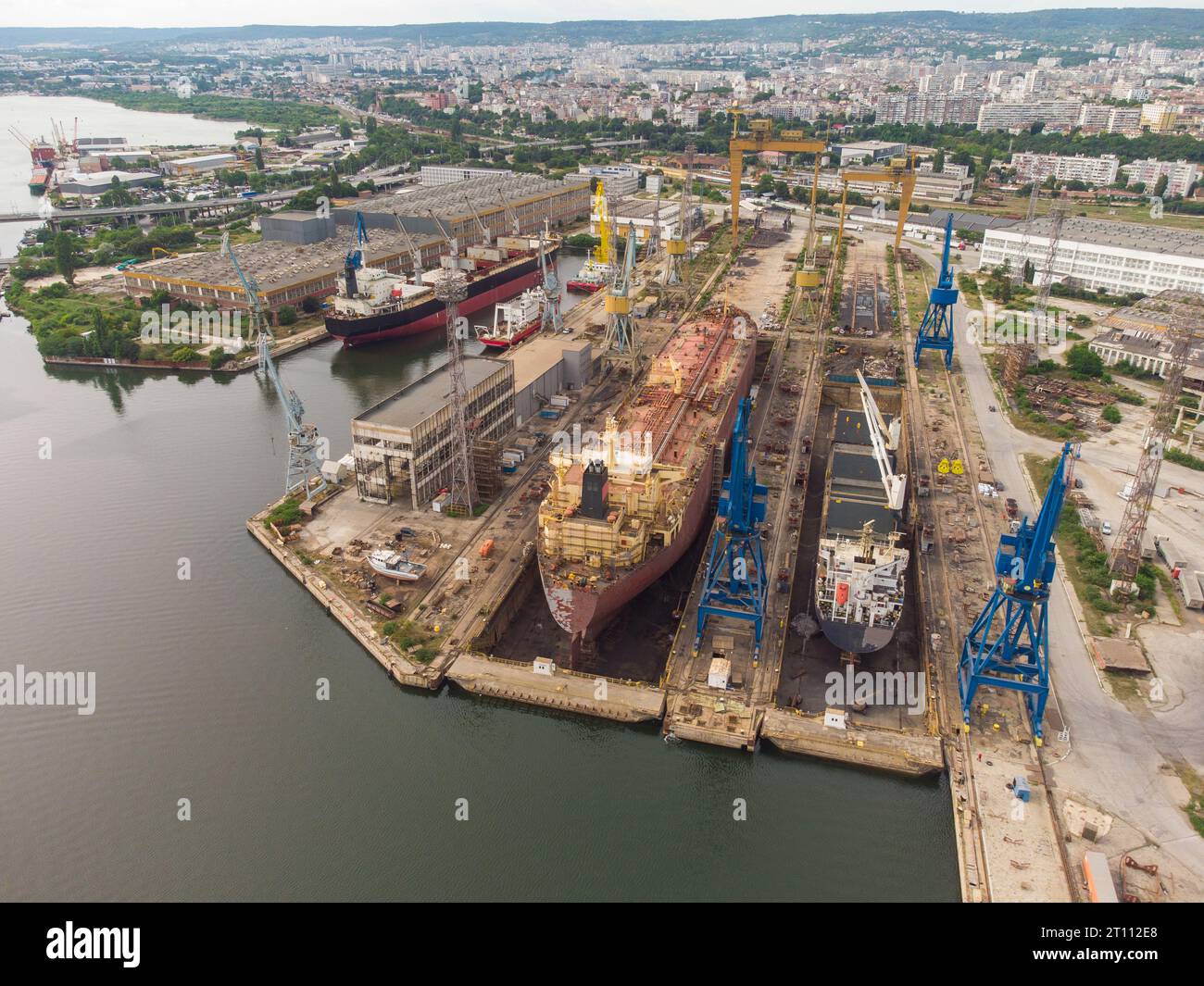 Tanker vessel repair in dry dock Shipyard, aerial top view Stock Photo ...