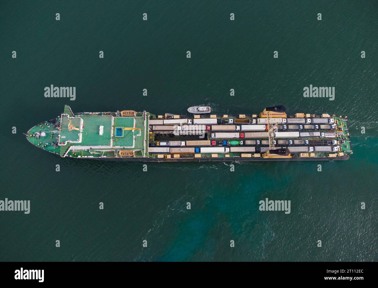 car ferry boat transports trucks in the sea, aerial top view Stock ...