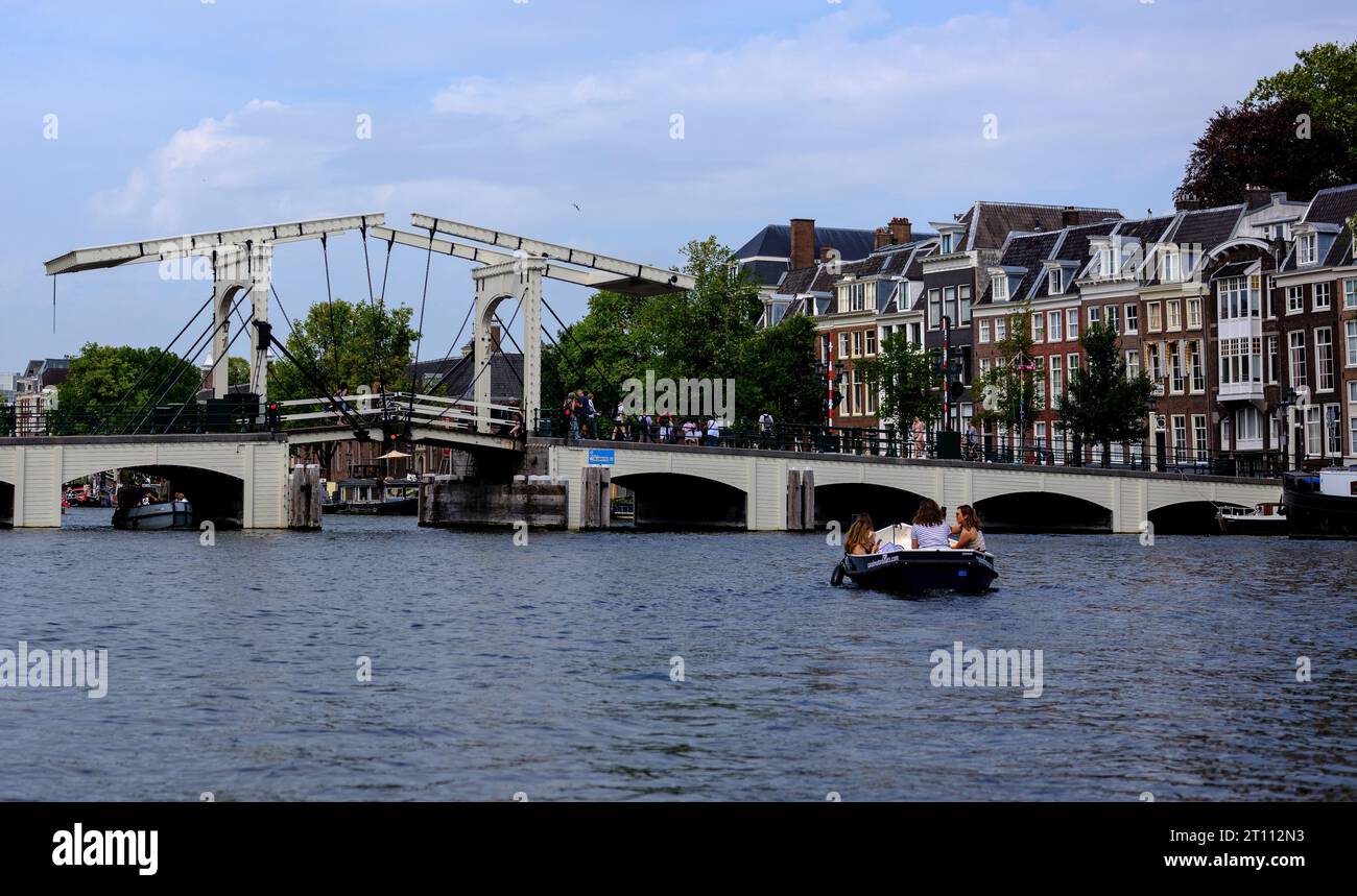 The Magere Brug ("Skinny Bridge") is a bridge over the river Amstel in ...