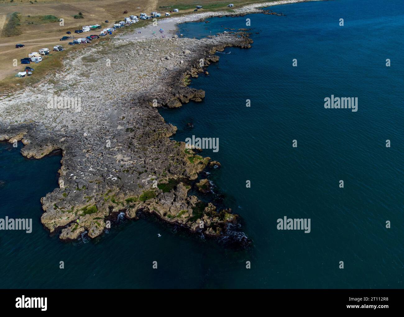 Aerial top view of caravan campers on the sea cost at sunny day, Black ...