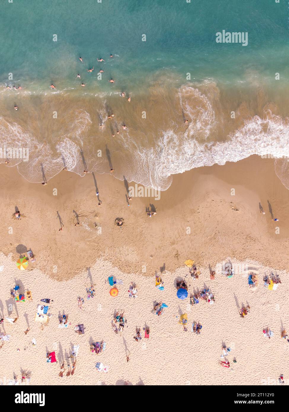 Aerial top View From Flying Drone Of People Crowd Relaxing On Beach In ...