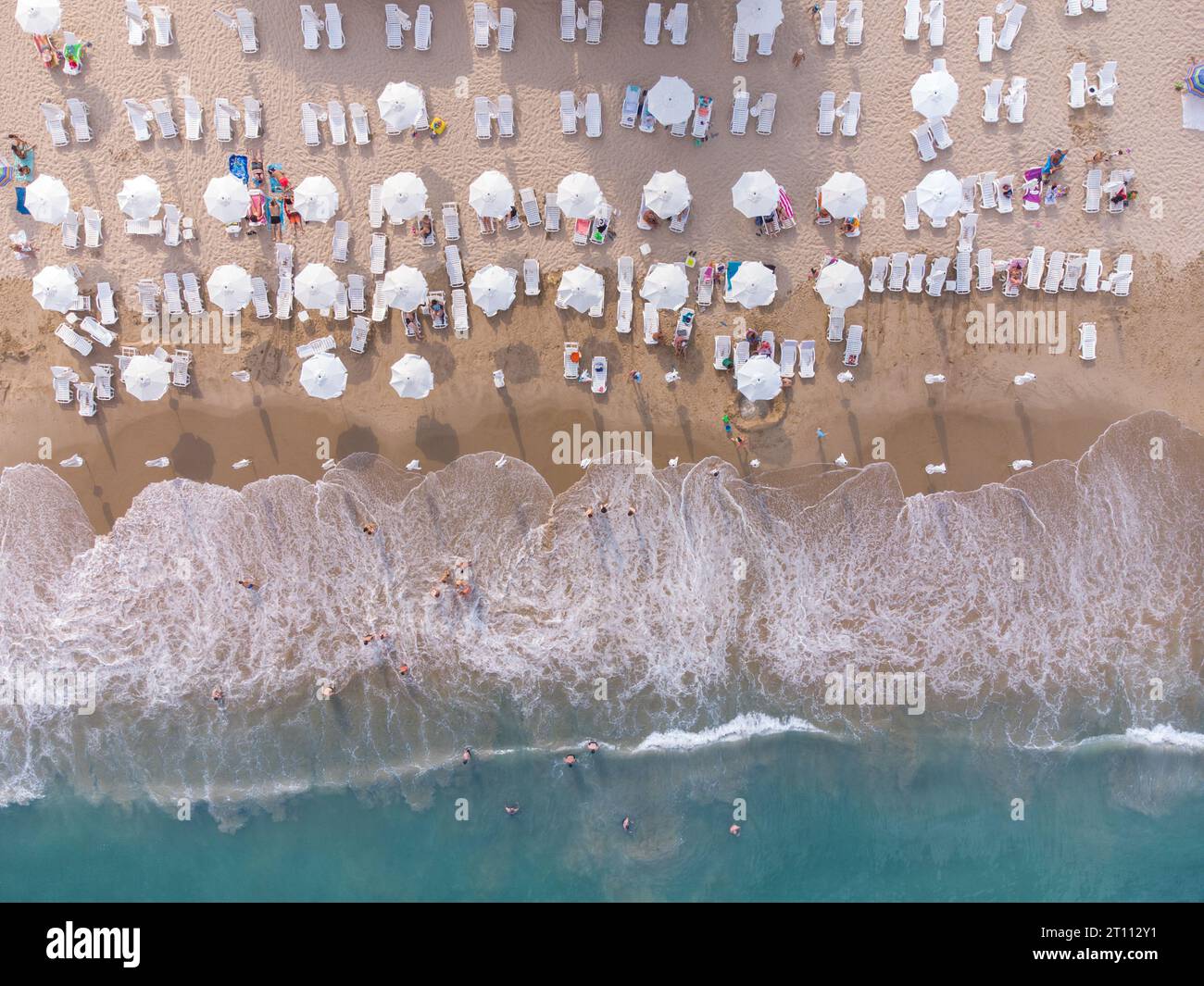 Aerial top View From Flying Drone Of People Crowd Relaxing On Beach In ...