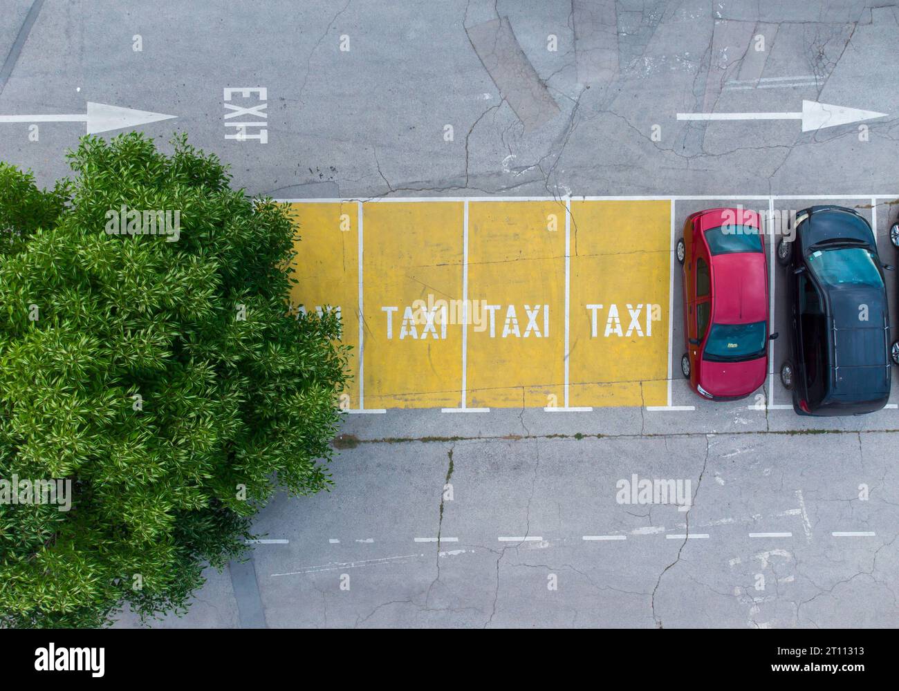 Empty parking lot with car spaces for taxi, aerial top view Stock Photo ...