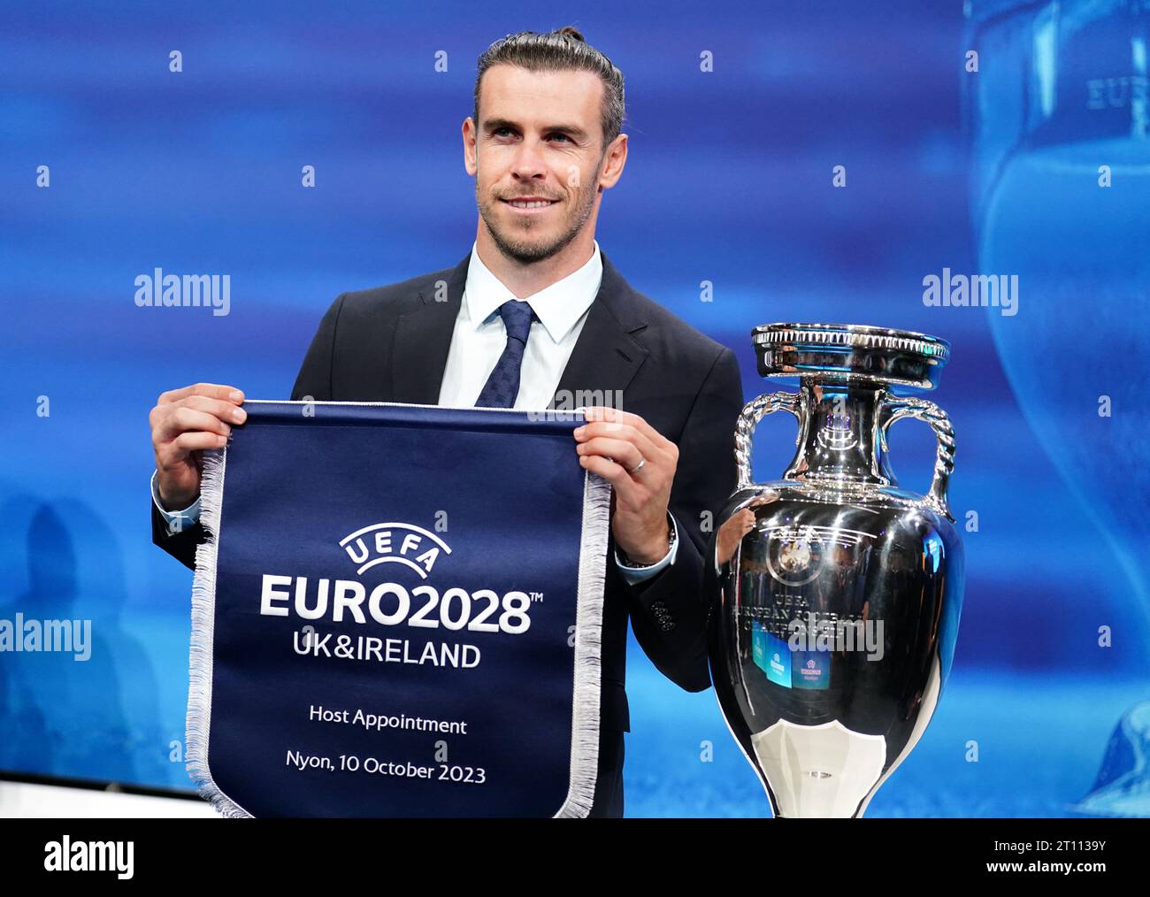 Wales delegate Gareth Bale holds a UEFA Euro 2028 pennant during the ...