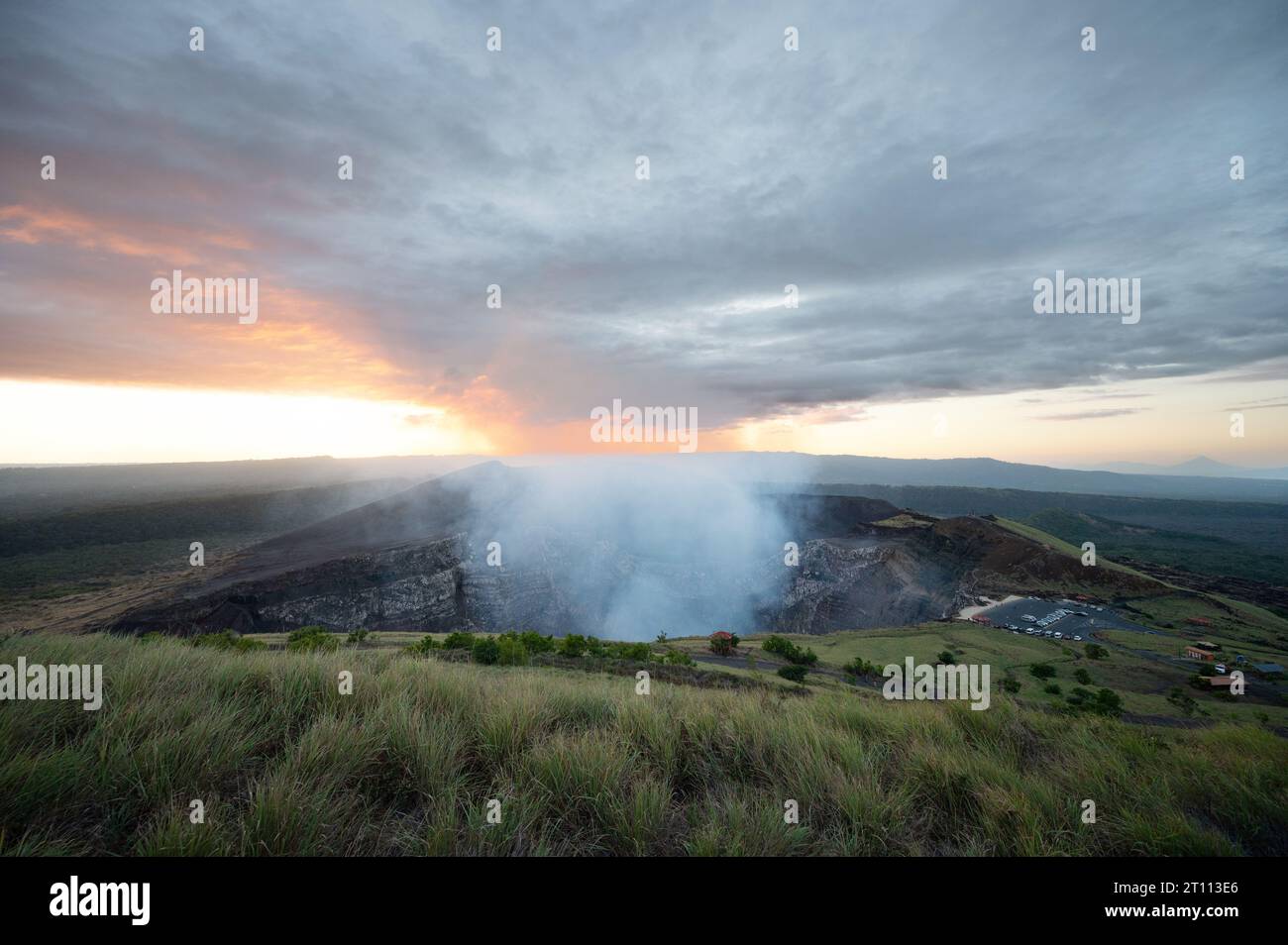 Nicaragua travel attraction theme. Masaya volcano crater with smoke ...