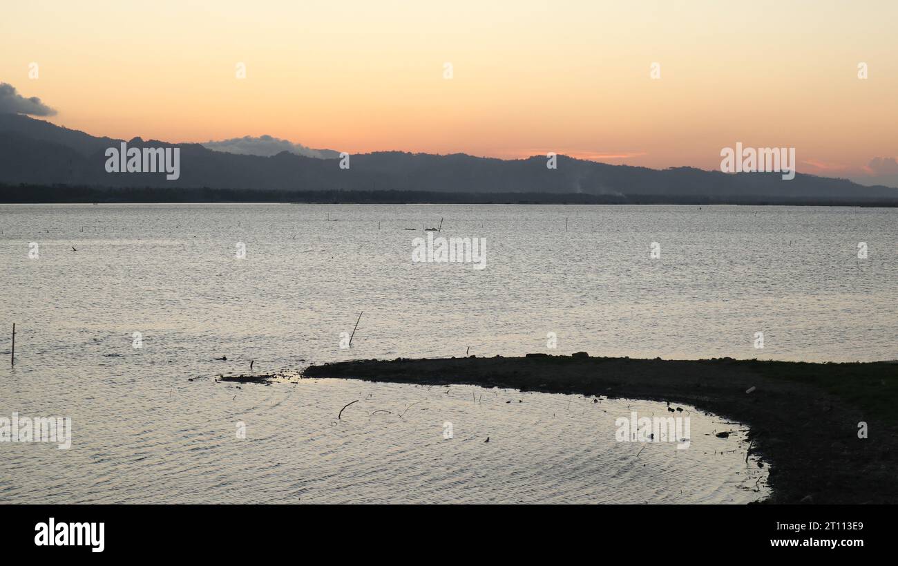 Beautiful golden sunset on the lake Stock Photo - Alamy