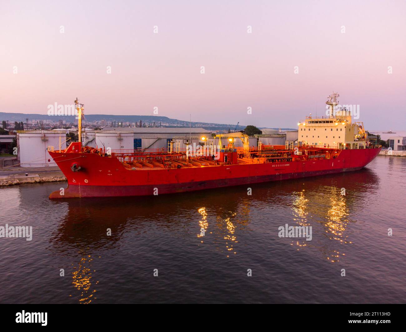 Aerial top view of oil ship tanker and lpg ship at industrial port at ...