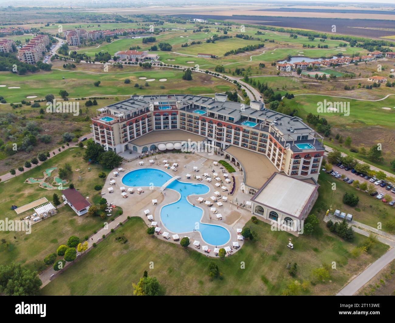 Aerial top view of beautiful luxury outdoor swimming pool in hotel ...