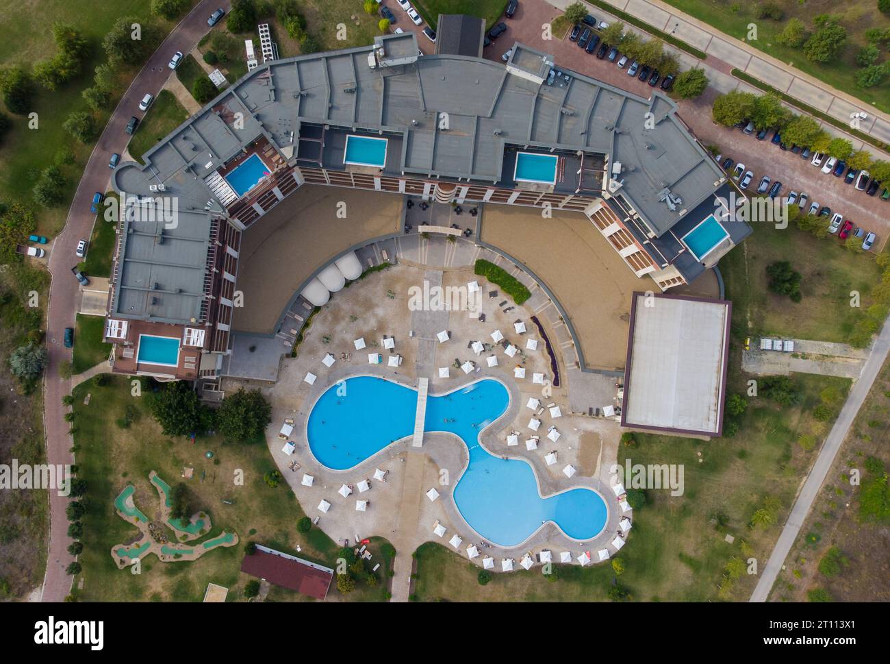 Aerial top view of beautiful luxury outdoor swimming pool in hotel ...