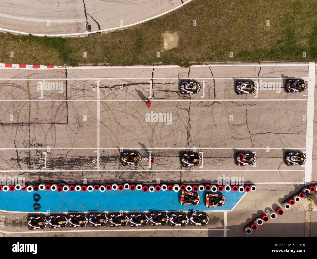 aerial top view of the karting track during the race. Several racing ...