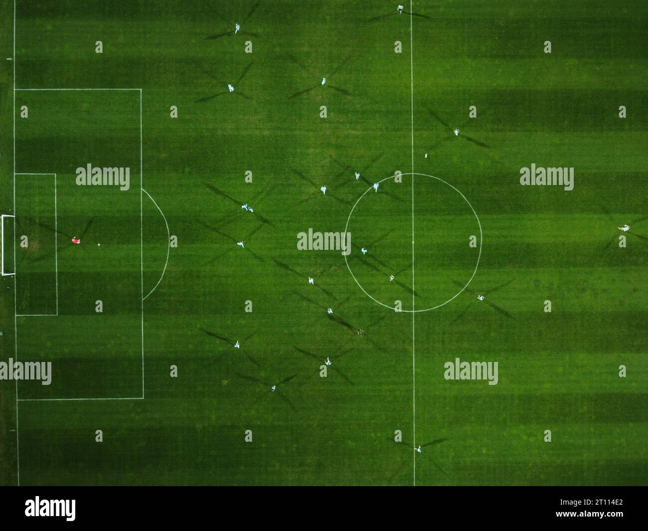 Aerial view of a football match, soccer. Football field and Footballers ...
