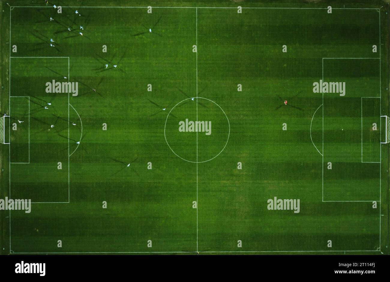 Aerial view of a football match, soccer. Football field and Footballers ...