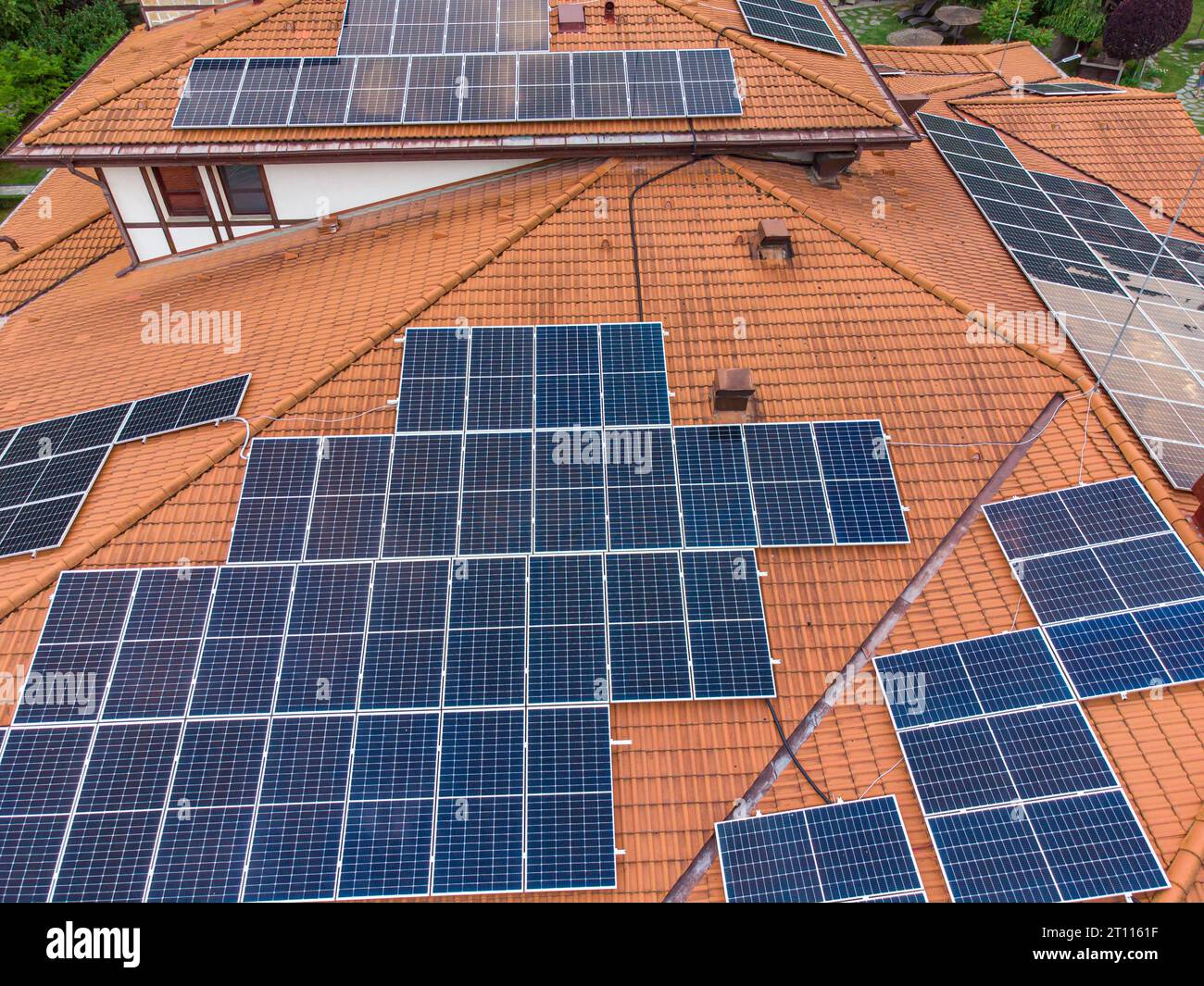 Top view of building rooftop with solar energy collector panels hi-res ...