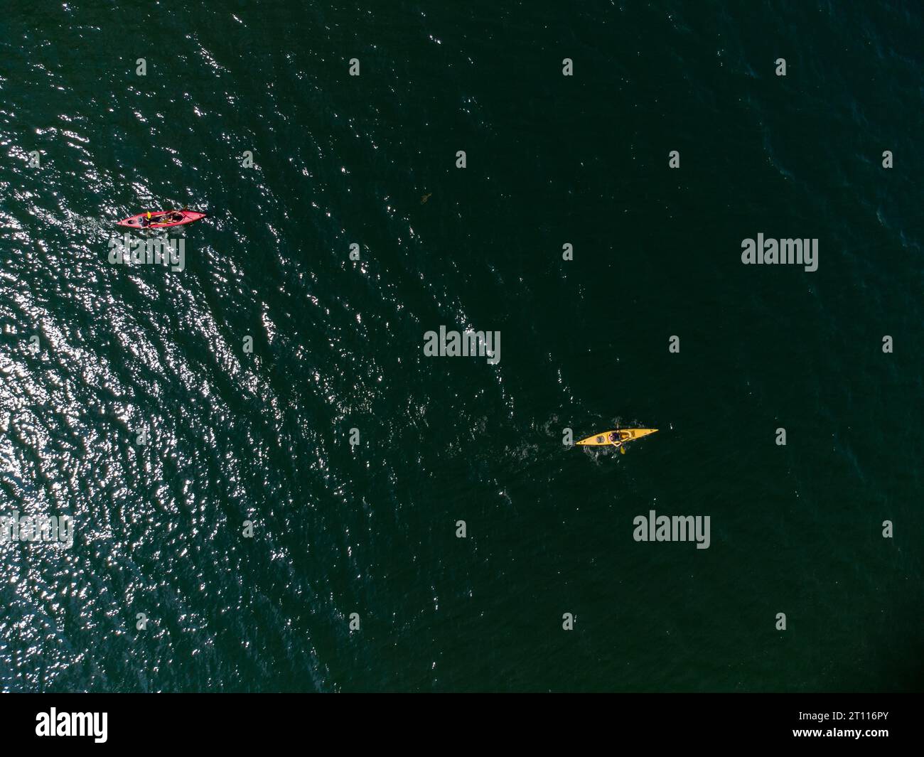 Aerial top view of kayak on the lake in mountains Stock Photo - Alamy