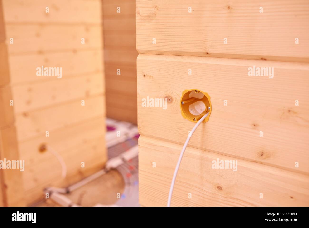 installation of electrical wiring inside a wooden house, nobody Stock ...