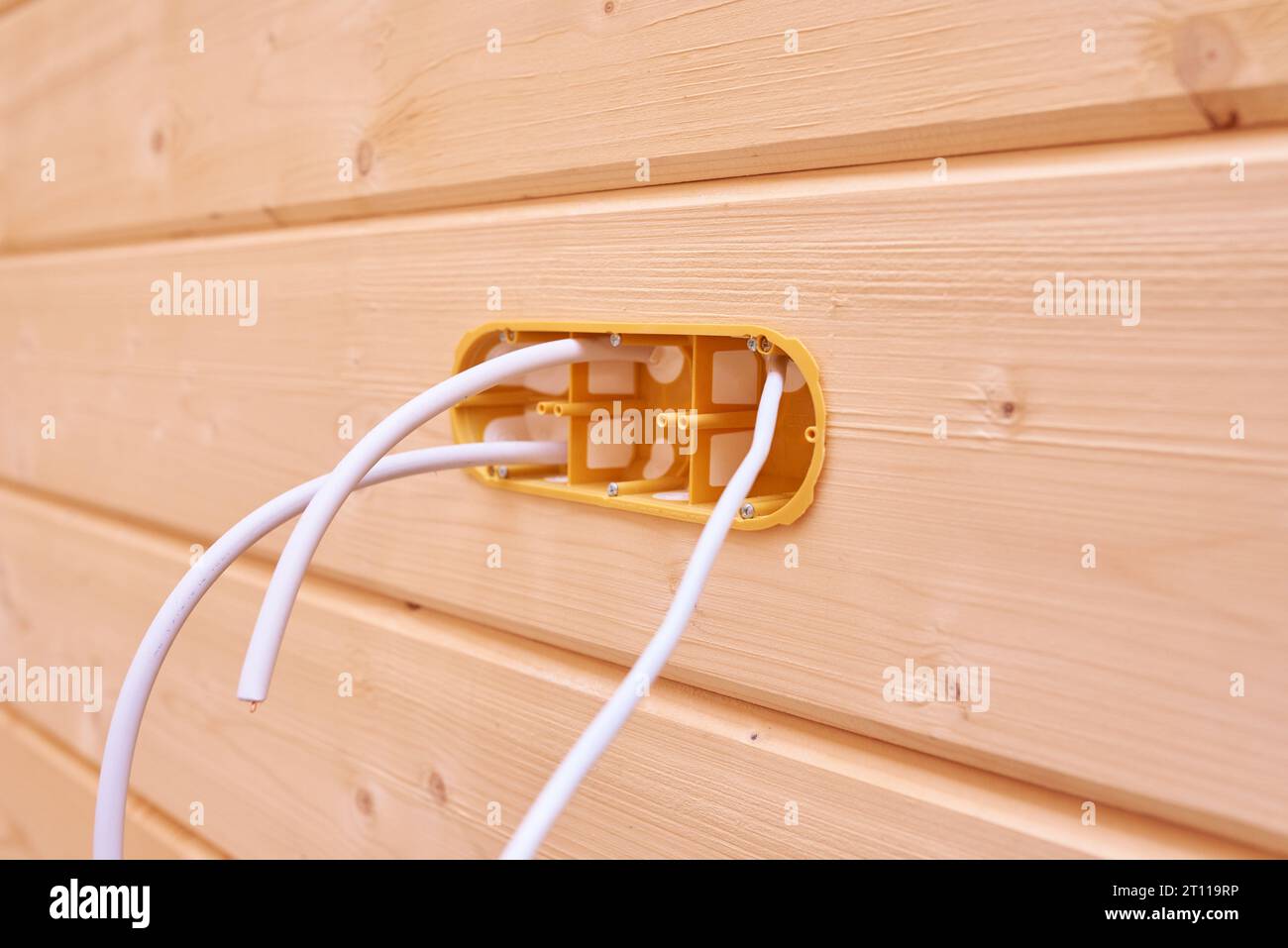 installation of electrical wiring inside a wooden house, nobody Stock ...