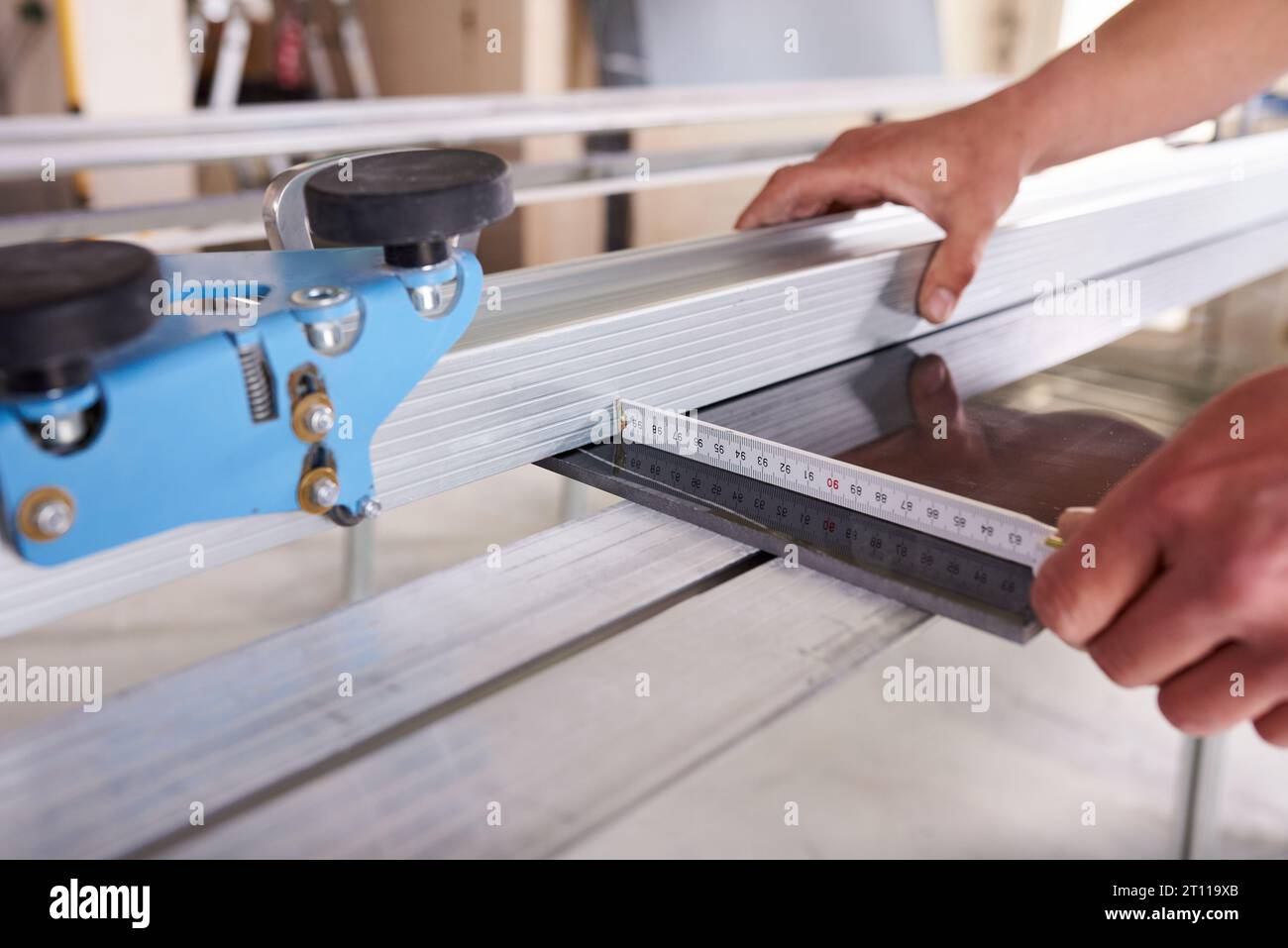 Construction worker cutting ceramic tiles using ceramic cutter Stock ...