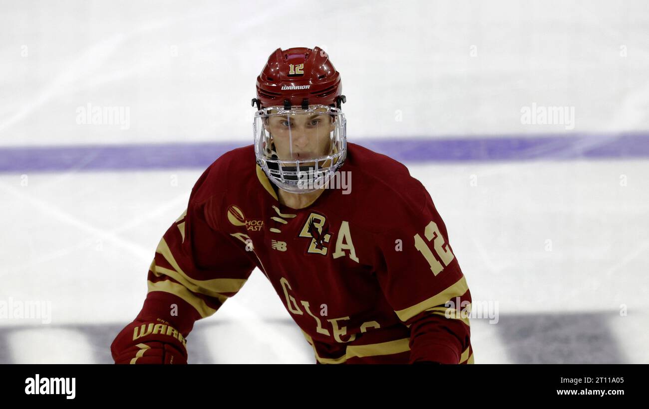 Boston College forward Mike Posma (12) skates during the third period ...