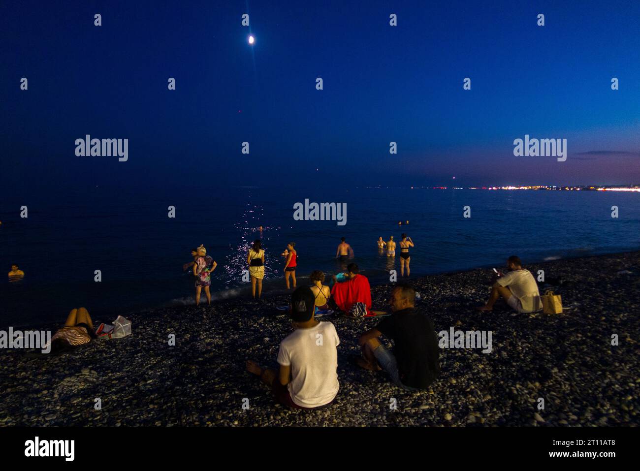 Sunbathers and Moonbathers stay on the beach at Nice in France after ...