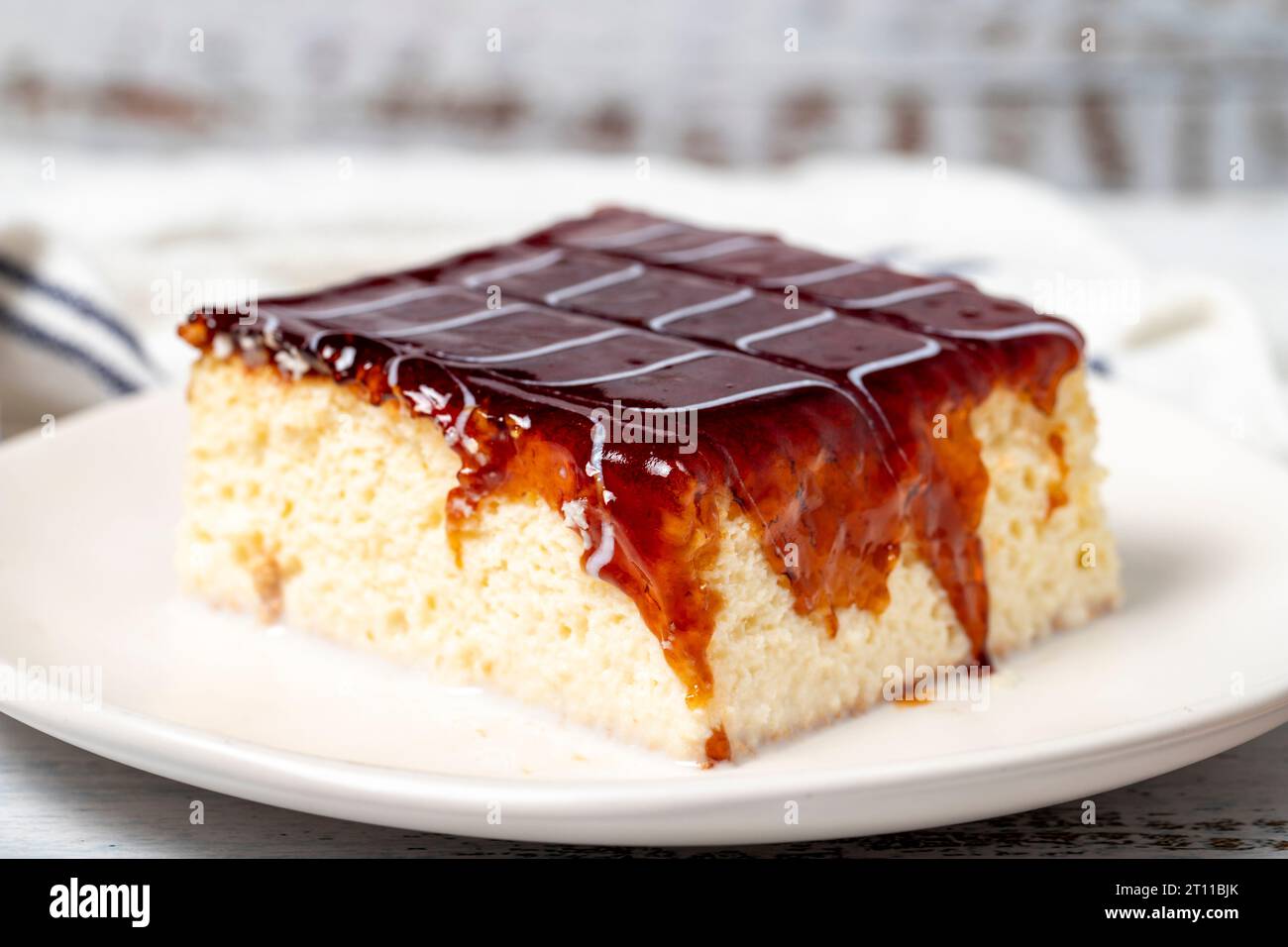 Tres leches cake. Slices of trilece cake with milk and caramel on a ...