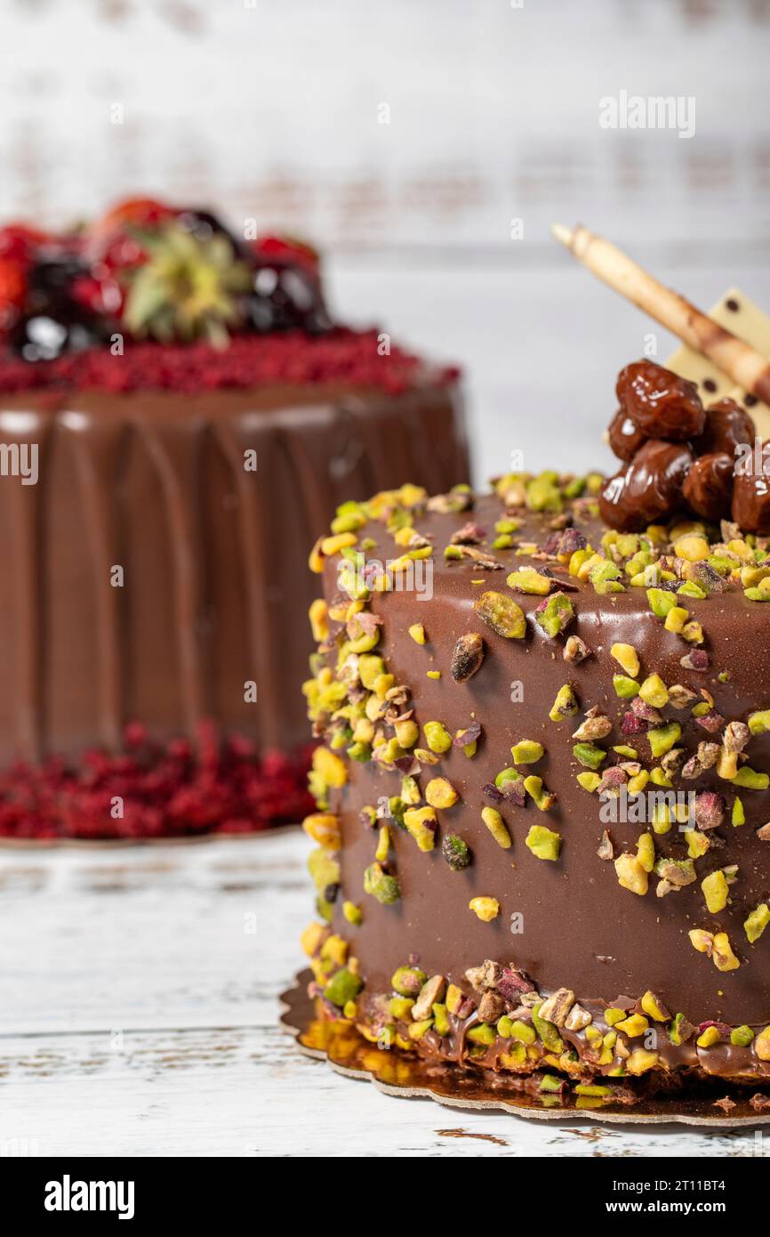 Varieties of chocolate cake. Various birthday cakes on wooden ...