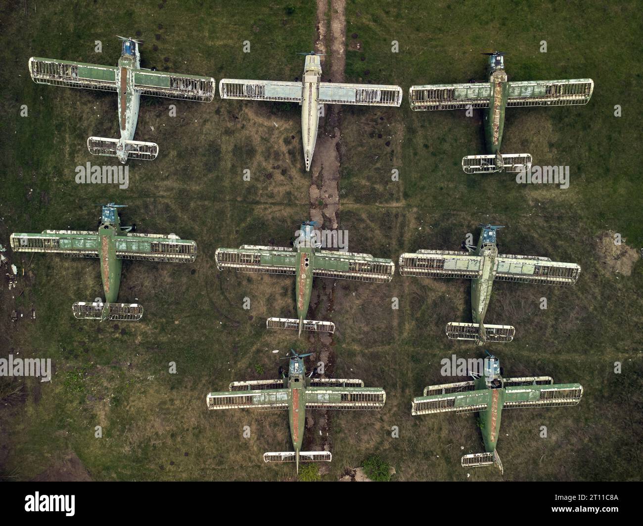 Old abandoned airfield with abandoned planes. Aerial view from a drone ...