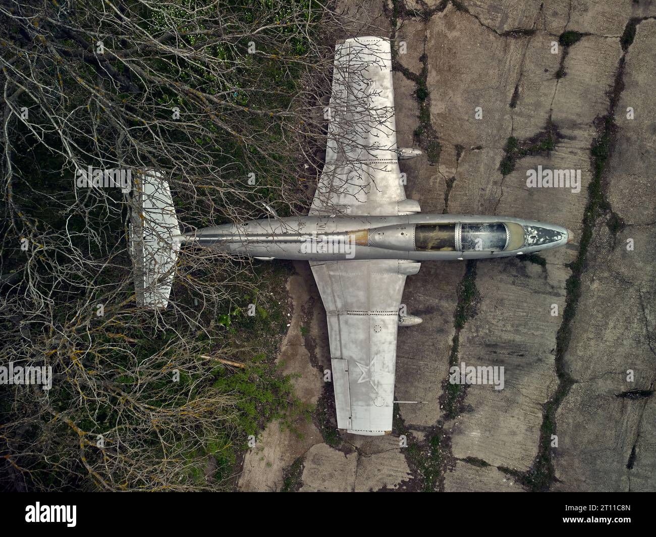 Old abandoned airfield with abandoned planes. Aerial view from a drone ...