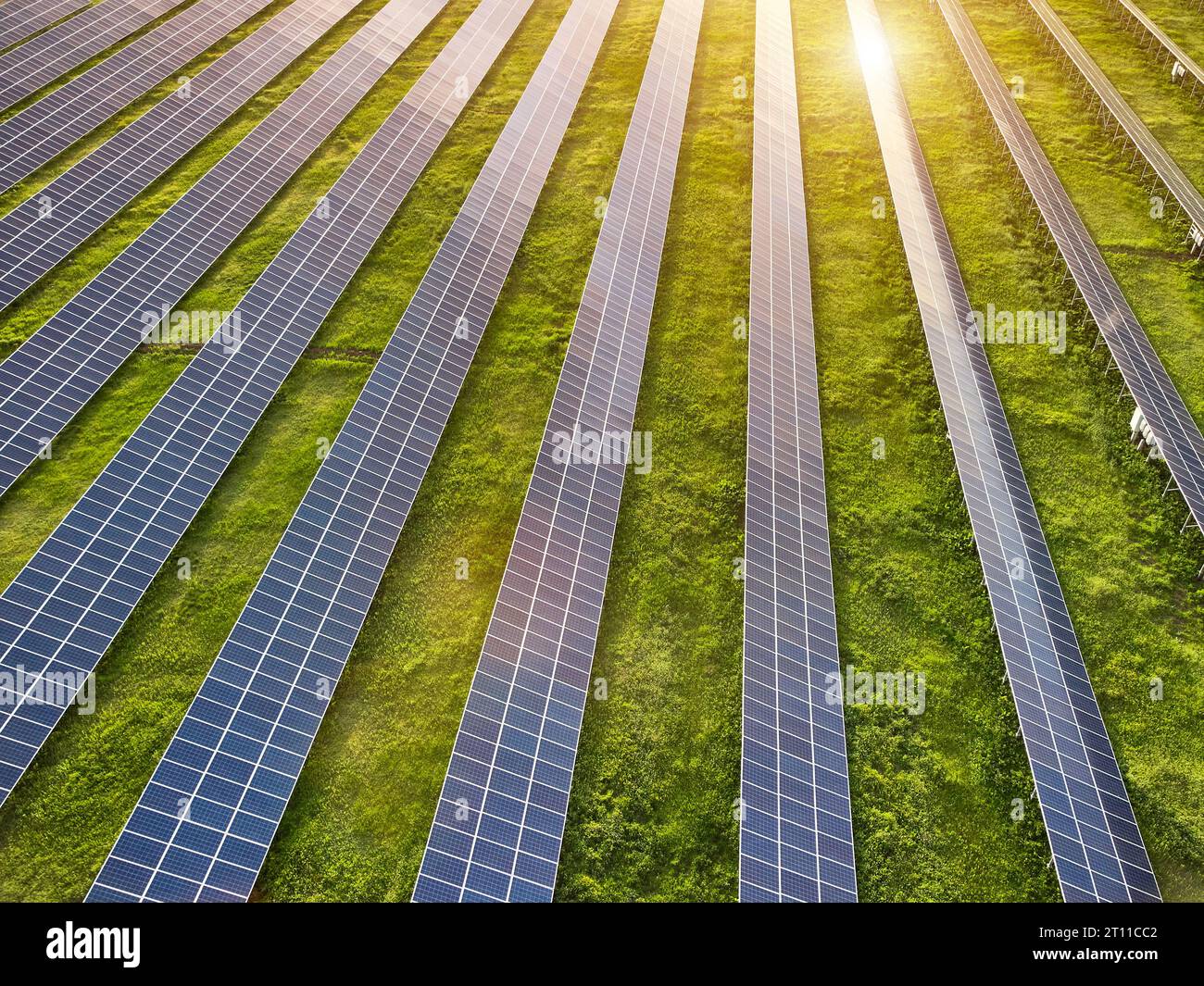 Aerial view of solar power plant in green meadow at sunny day Stock ...