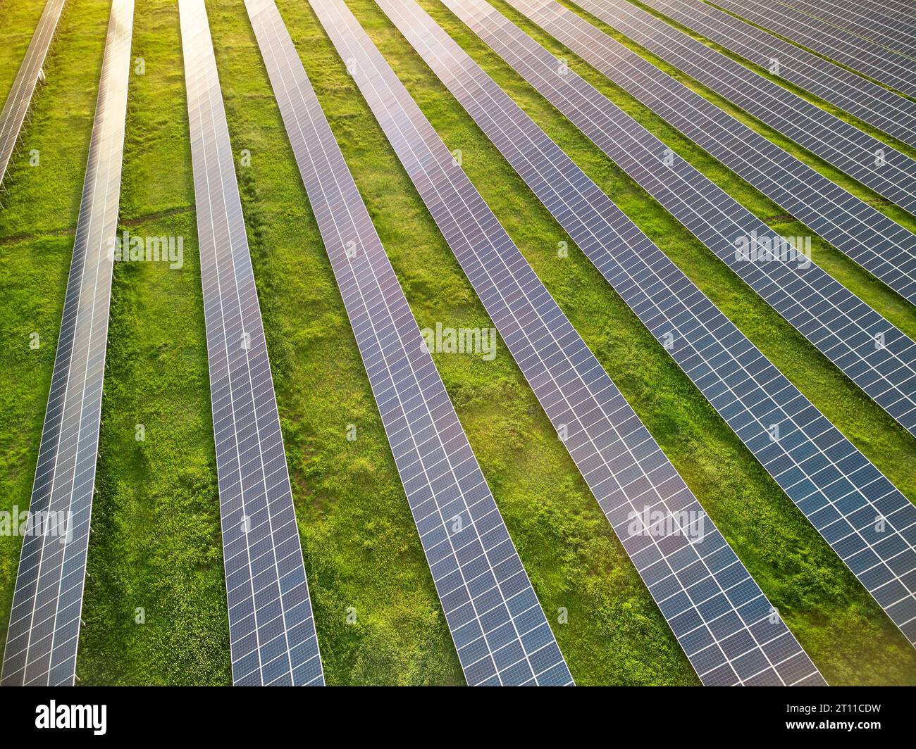 Aerial view of solar power plant in green meadow at sunny day Stock ...