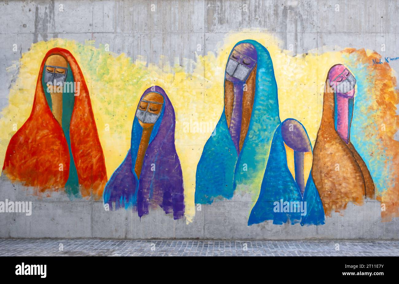 Mural of women in colorful abayas by Nada Khozestani, Fire Station ...